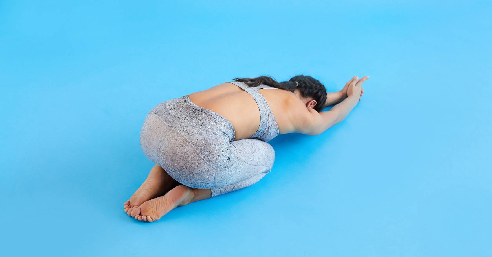 How To Do Half Tortoise Pose ClassPass how-to-do-half-tortoise-pose-classpass